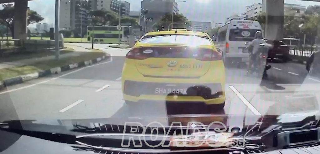 Taxi driver get off vehicle to check for damage