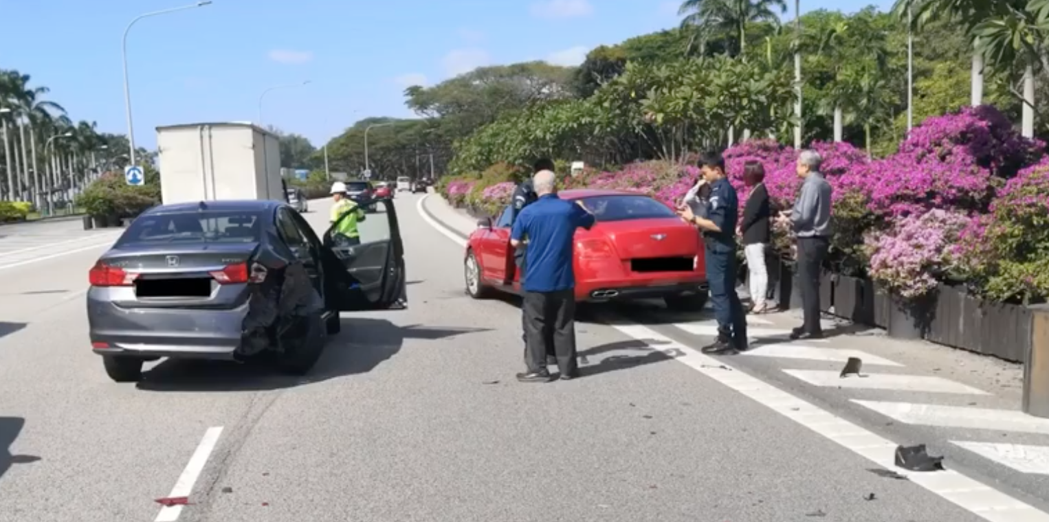 Red Bentley crashes into Honda City who stops abruptly on the ECP