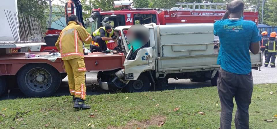 Lorry driver killed after crashing into back of trailer truck