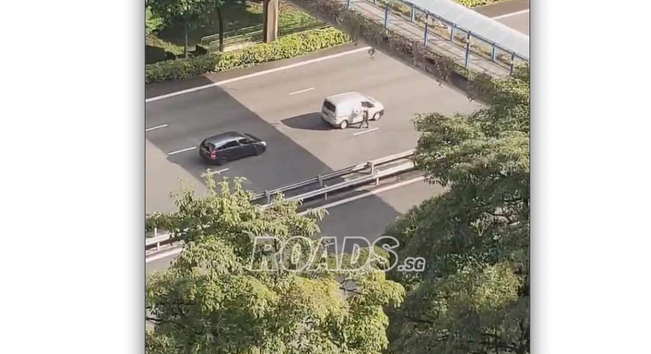 Driver stops van in middle of expressway while he gets out, gets rear ...