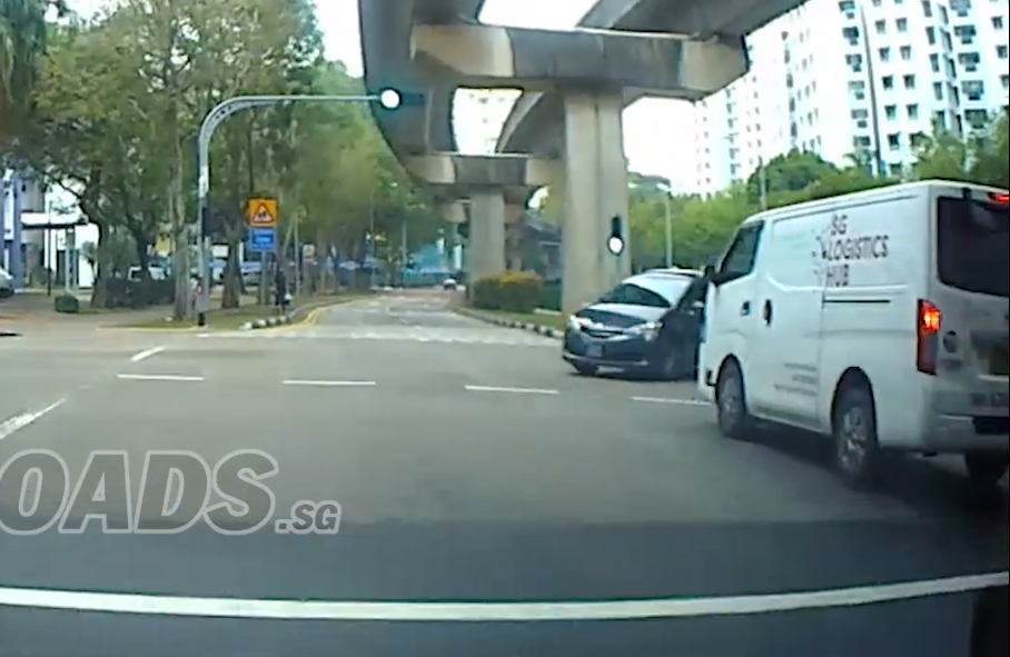 Accident between car and van at discretionary right turn in Sengkang