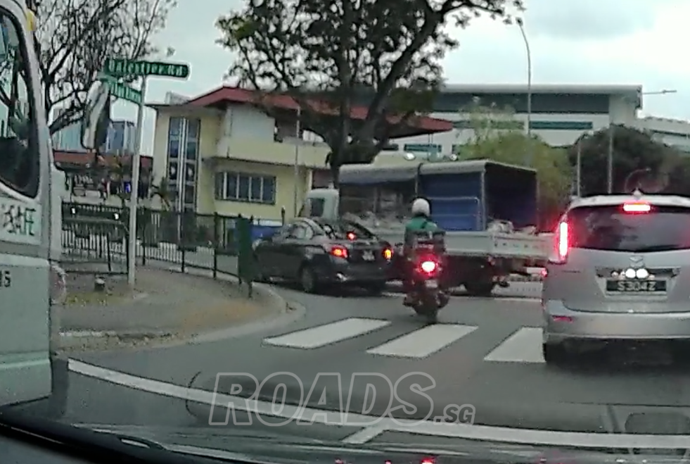 Lorry sideswipes car when both turn left